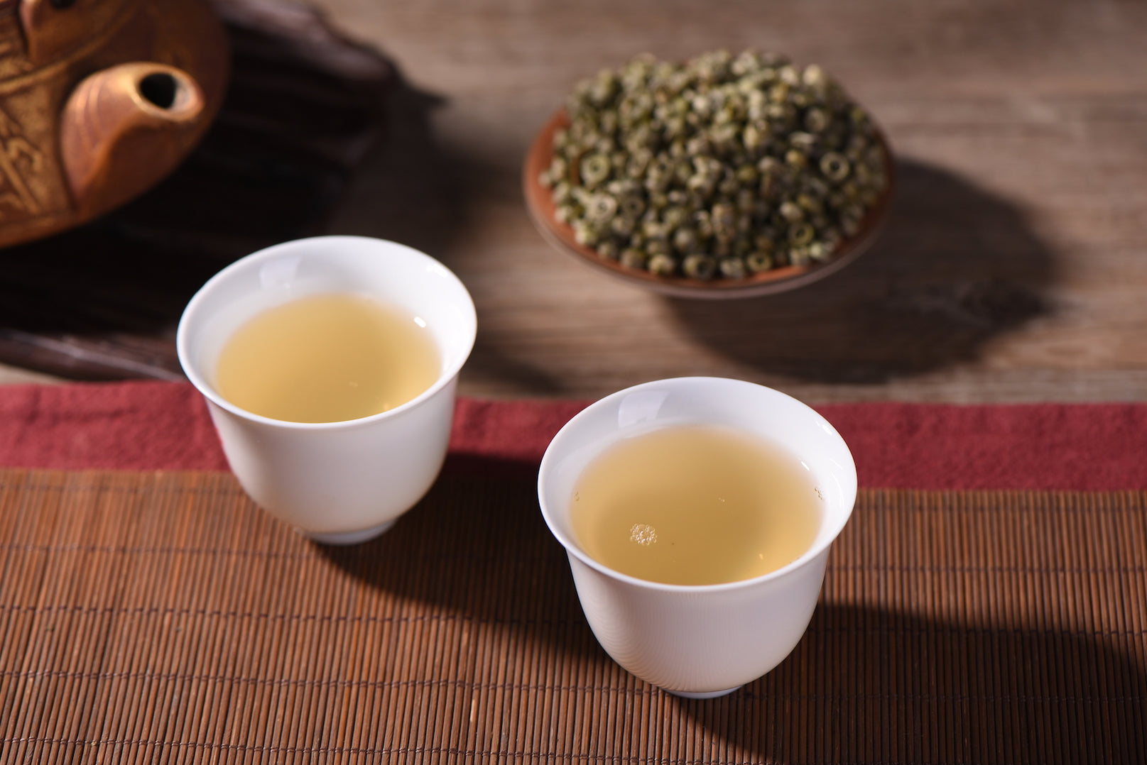 Jade Earrings * Superior Hand-Rolled White Tea Yunnan Sourcing Tea Shop